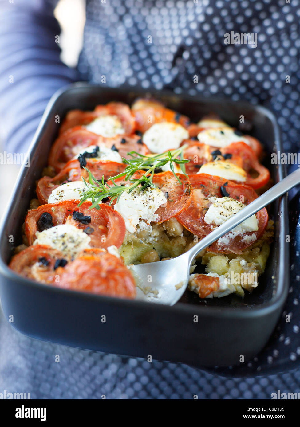 Fennel,potato,tomato,chickpea and goat's cheese Tian Stock Photo - Alamy