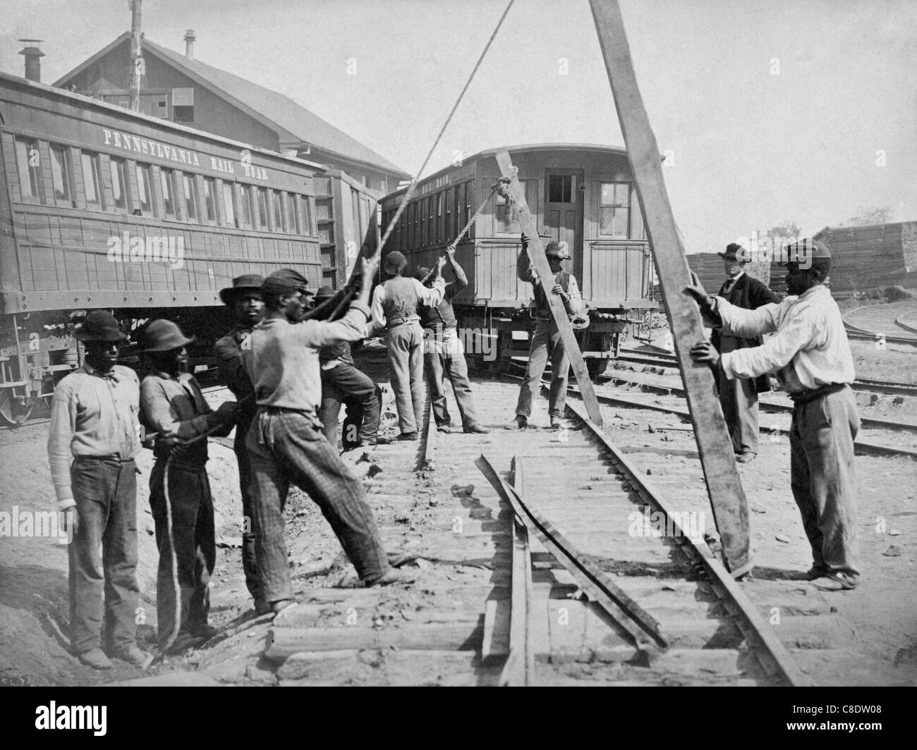 Military railroad operations in northern Virginia: men using levers for ...