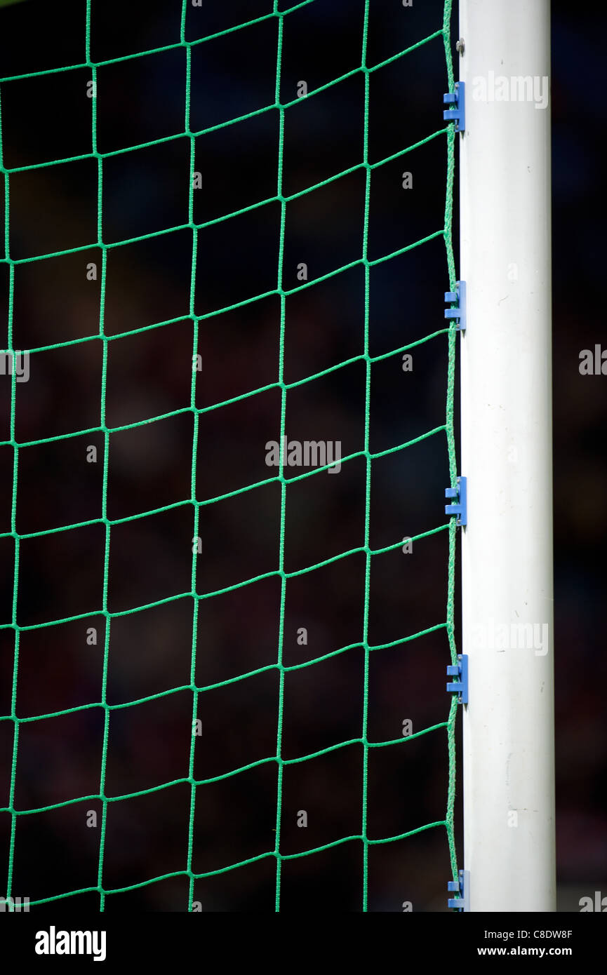 Green goal net and post Stock Photo - Alamy