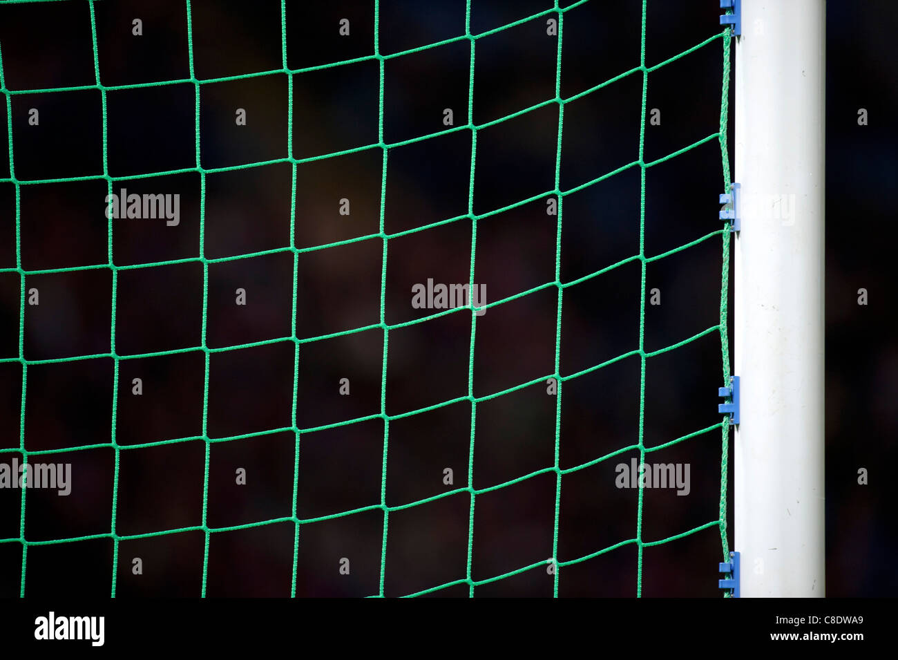 Green goal net and post Stock Photo - Alamy