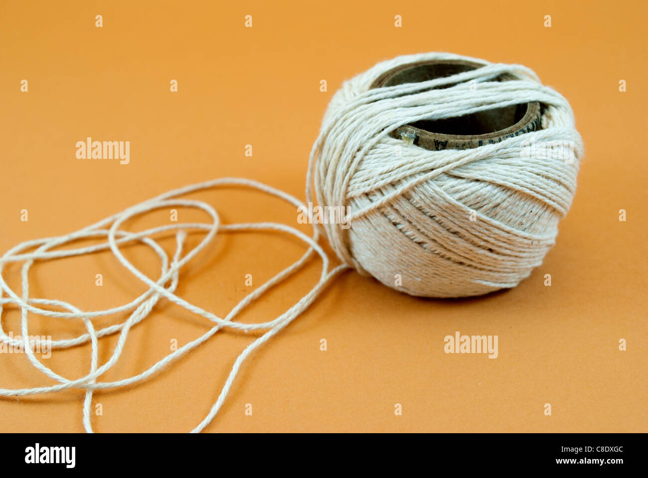 white thread ball of yarn Stock Photo - Alamy
