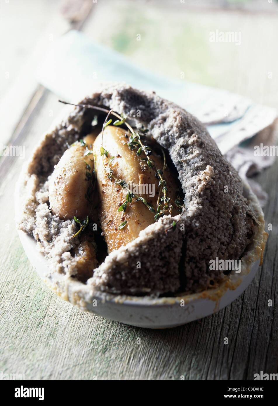 Chicken in salt crust hi-res stock photography and images - Alamy