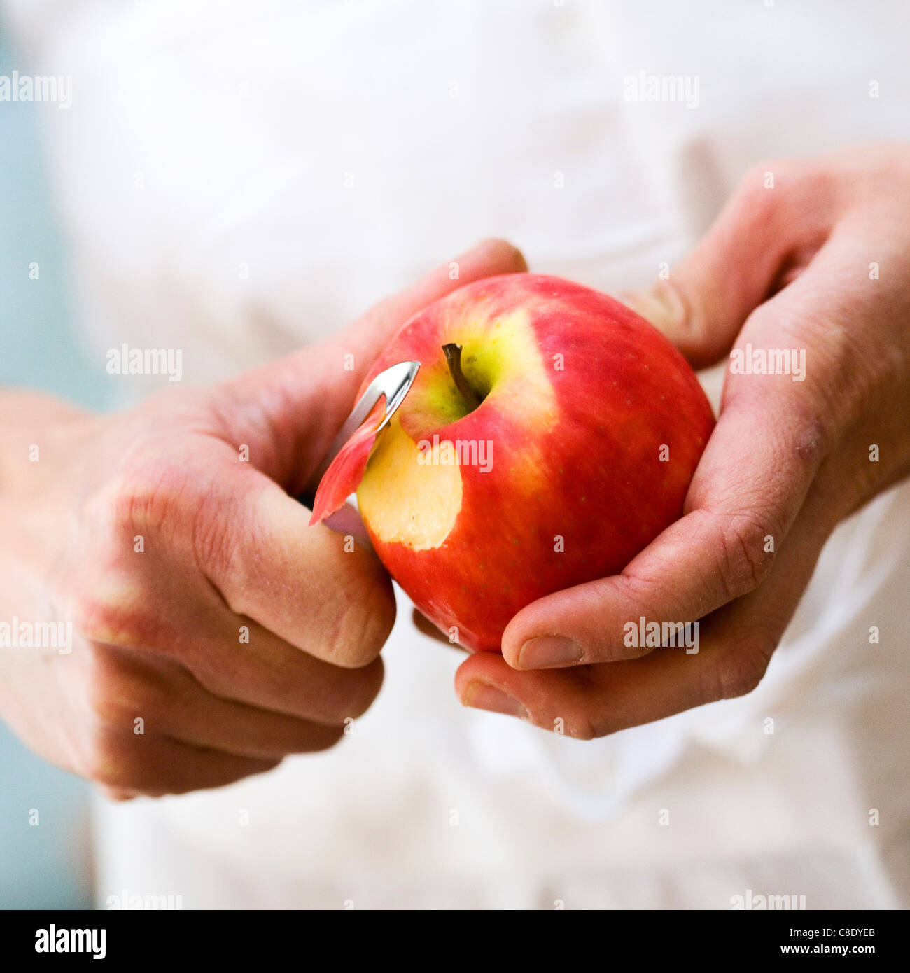 Peeling an apple Stock Photo - Alamy