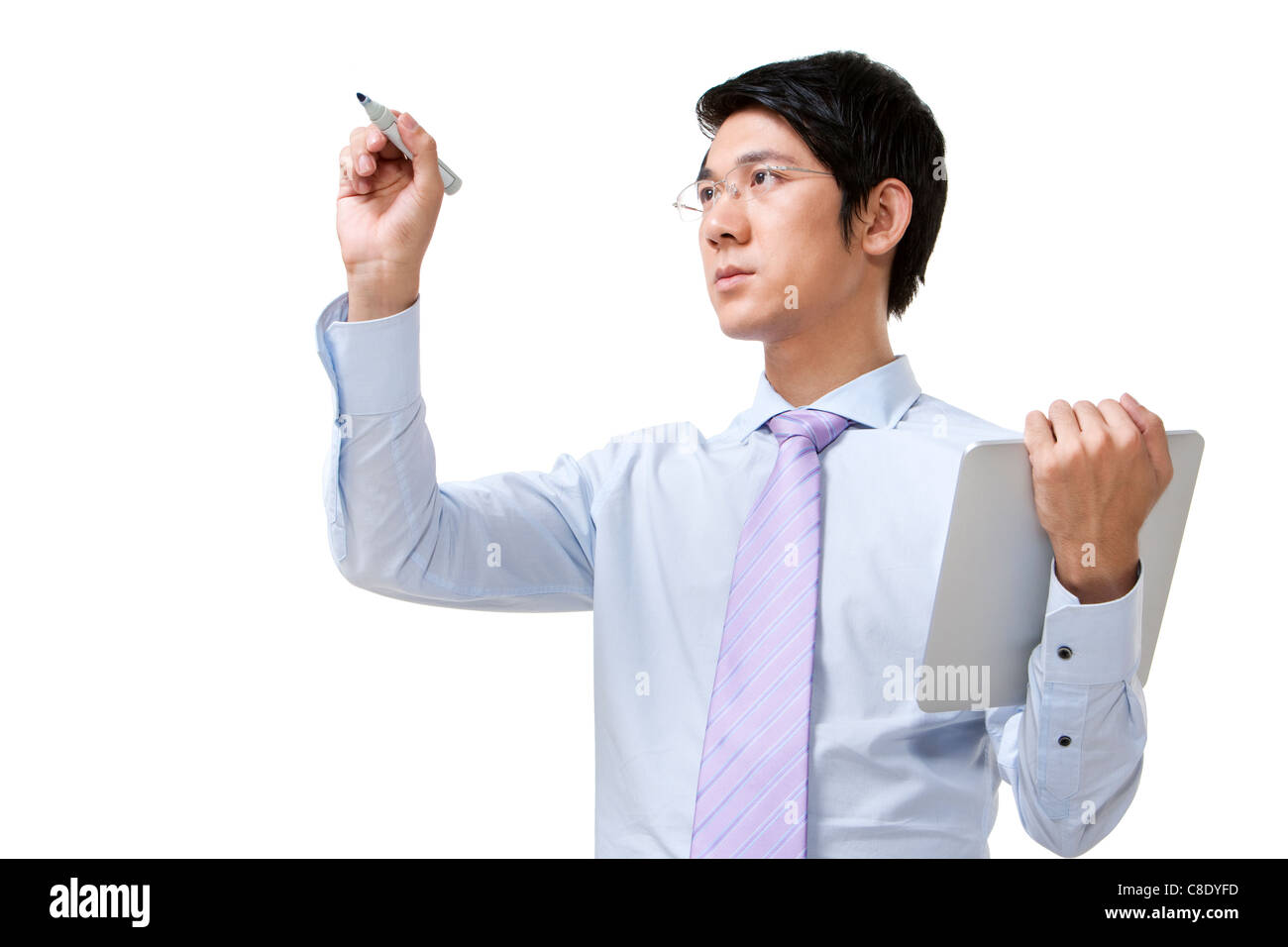 Standing looking down holding writing authority hi-res stock ...