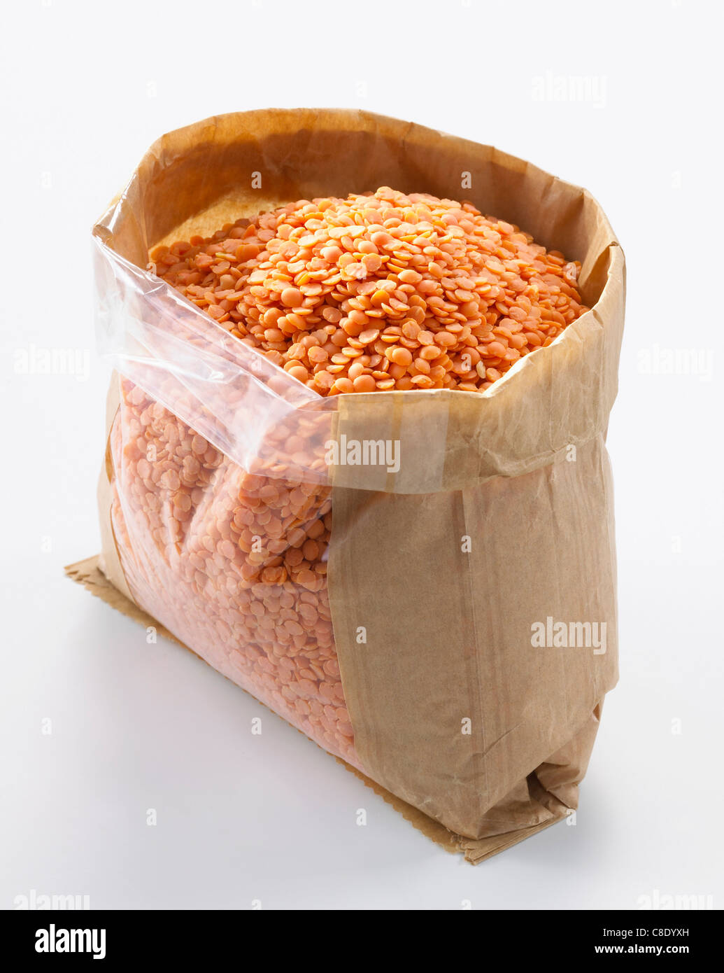 Bag of orange lentils Stock Photo - Alamy