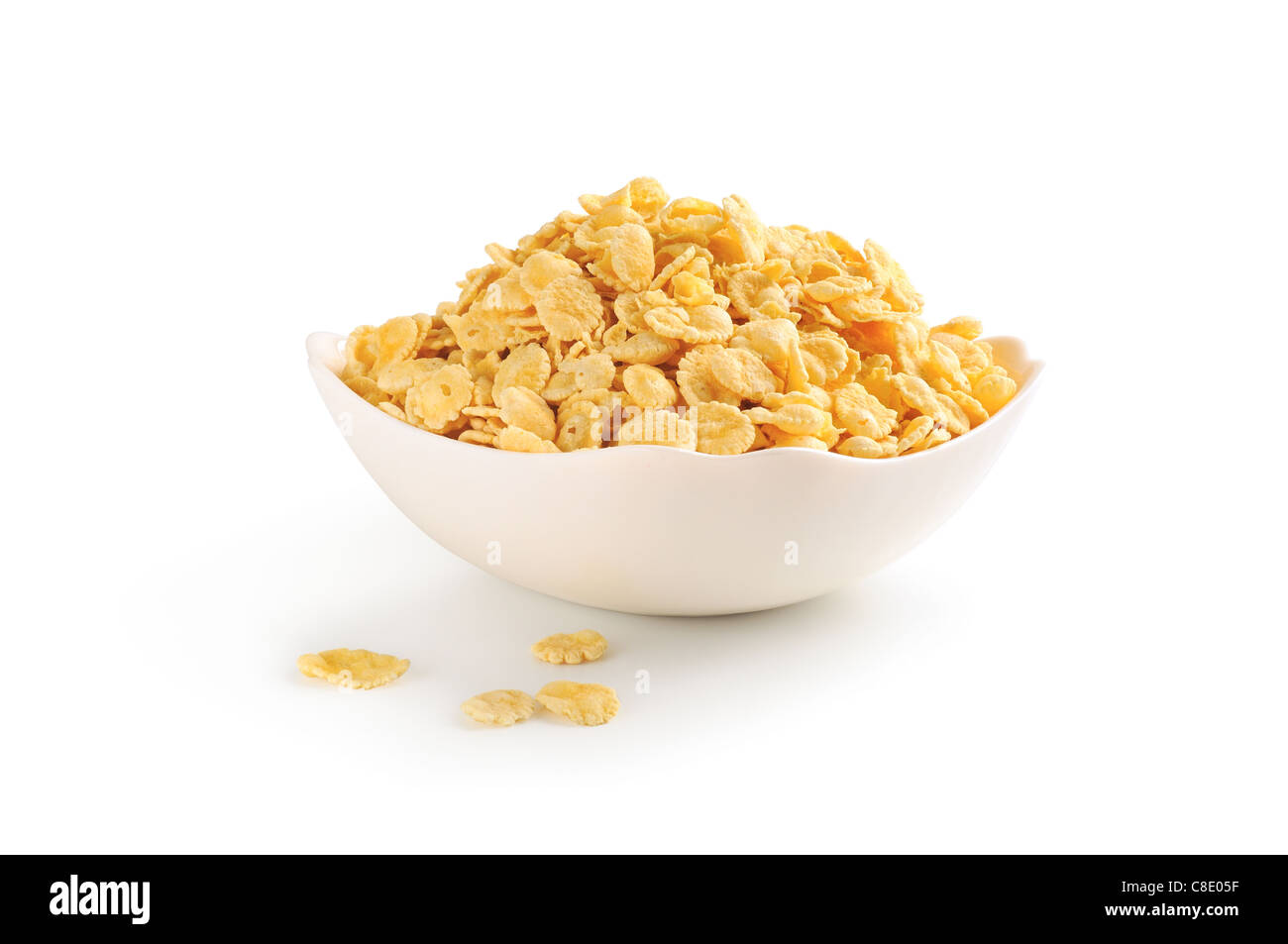 Cornflakes in porcelain bowl isolated on white background Stock Photo ...