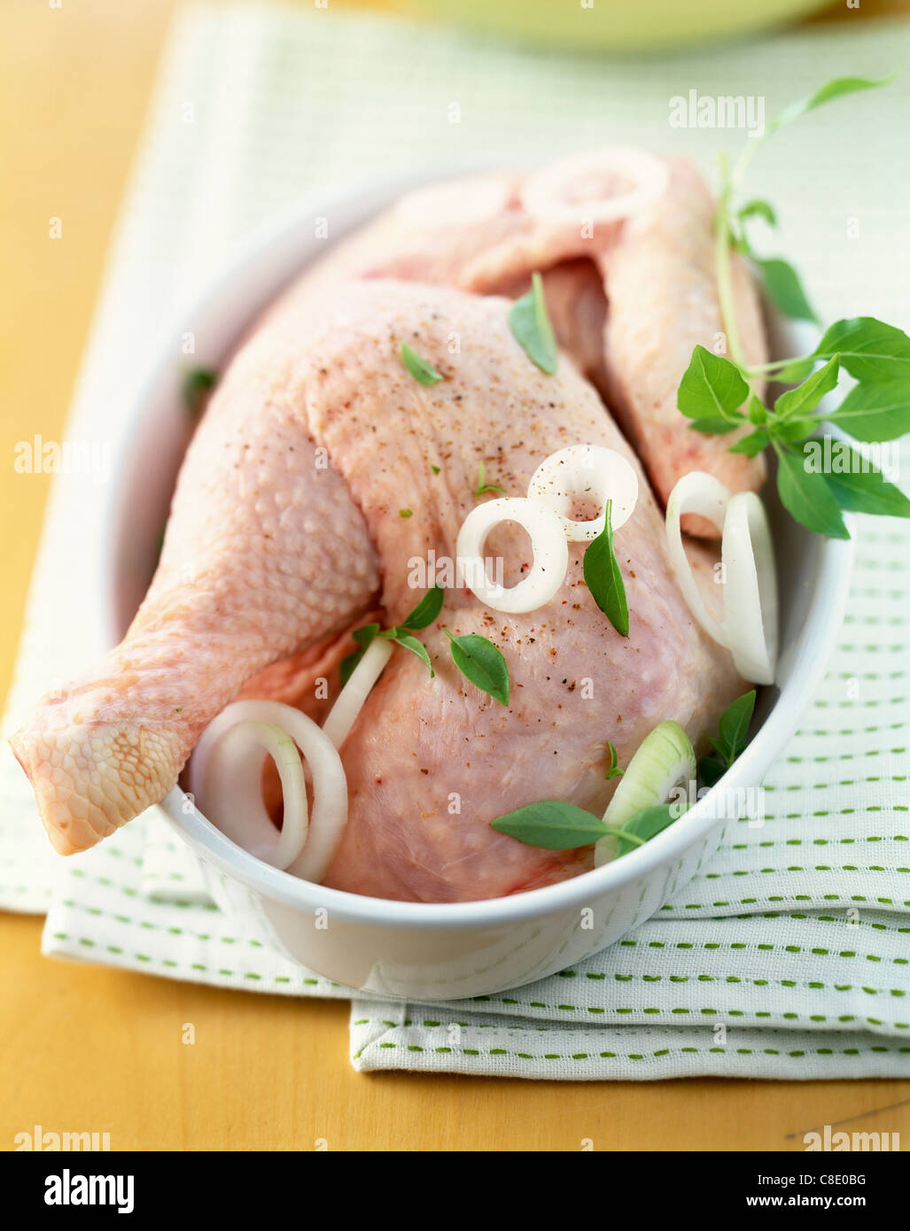Half a raw chicken before cooking Stock Photo - Alamy
