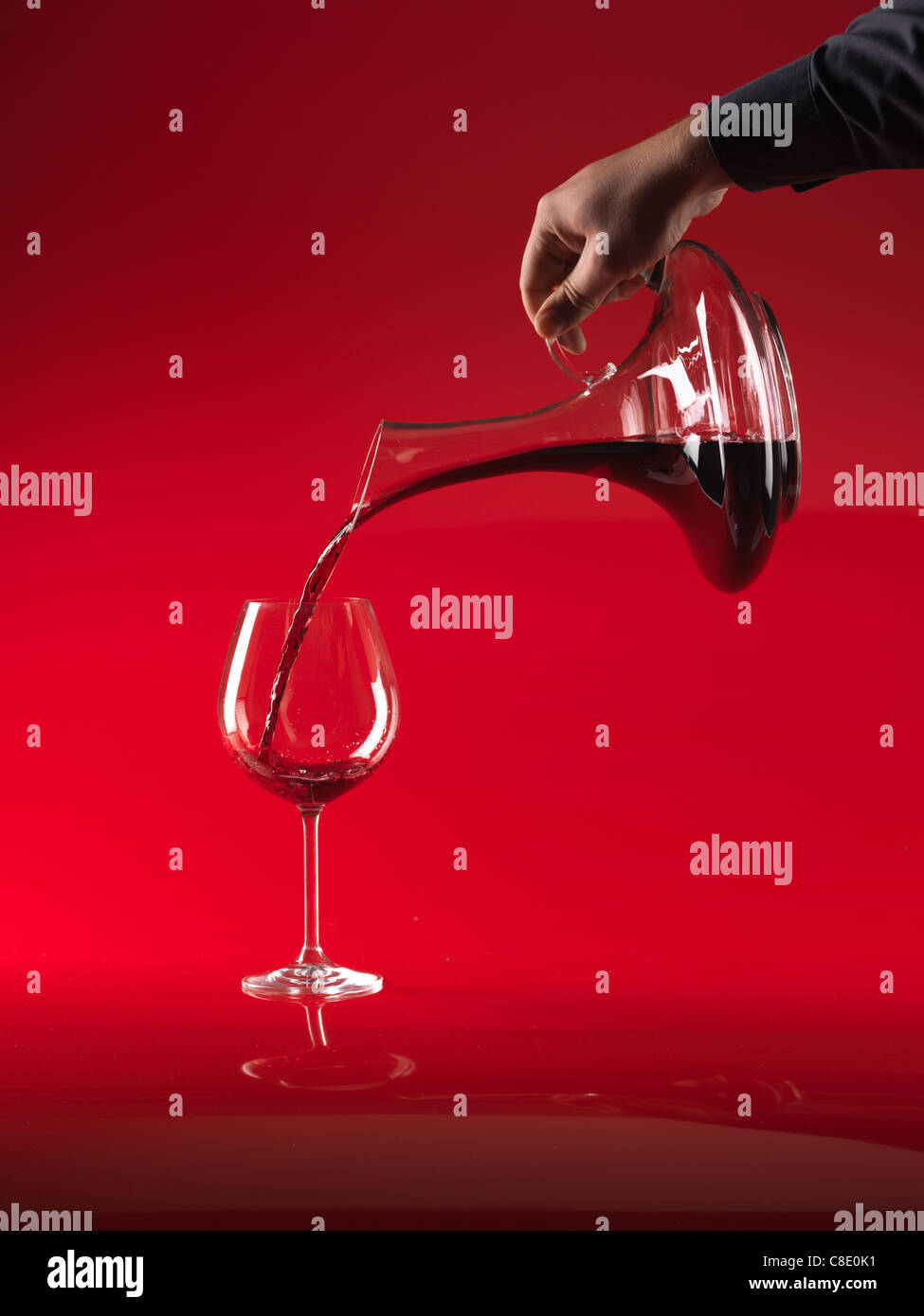 Hand holding red wine glass silhouette hi-res stock photography and ...