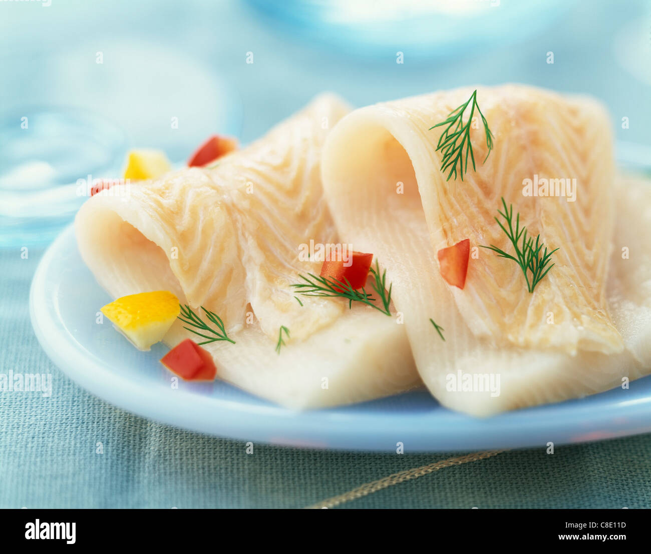 Raw cod fillets Stock Photo - Alamy