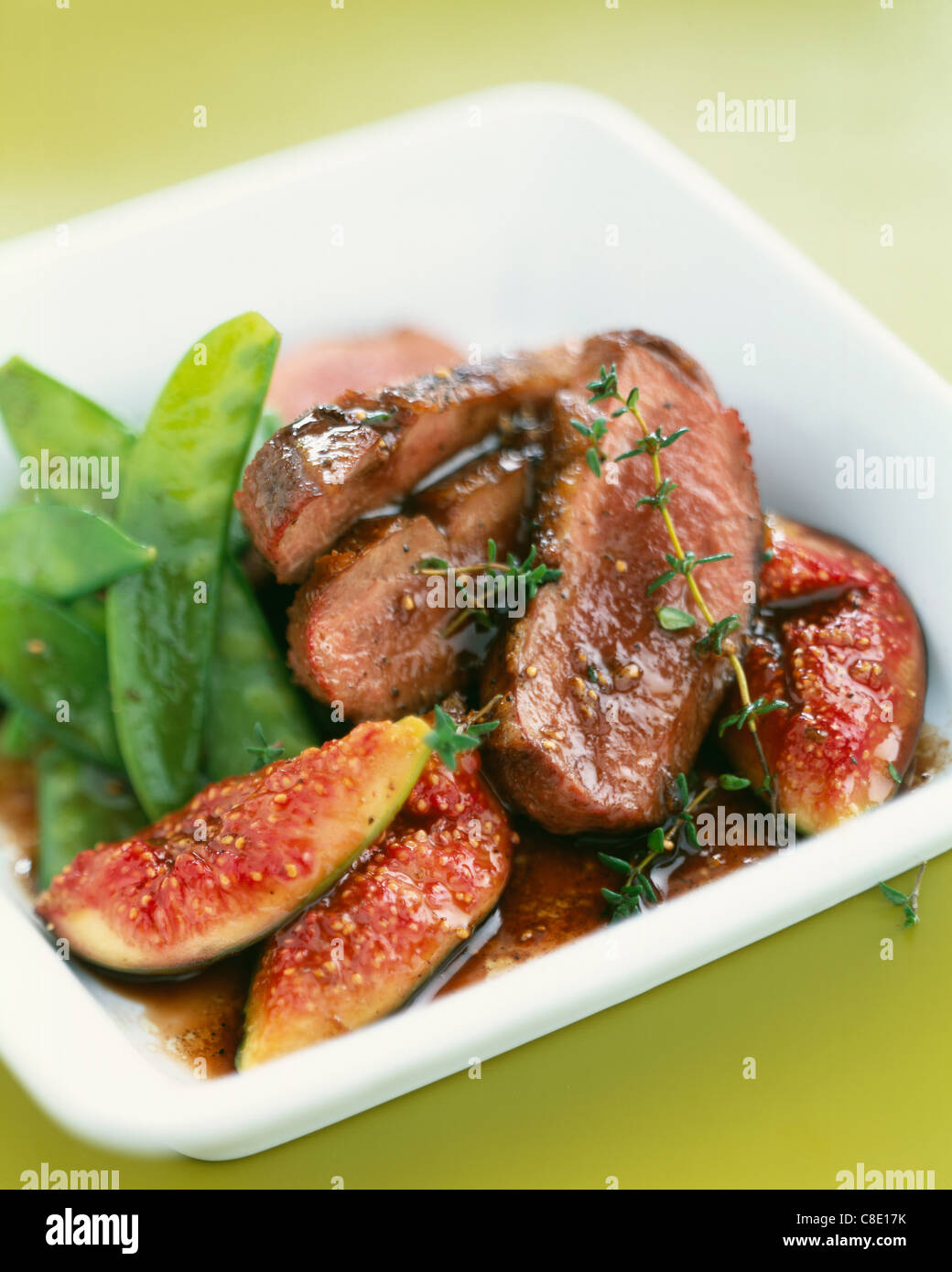 Duck magret with figs and four spices Stock Photo - Alamy