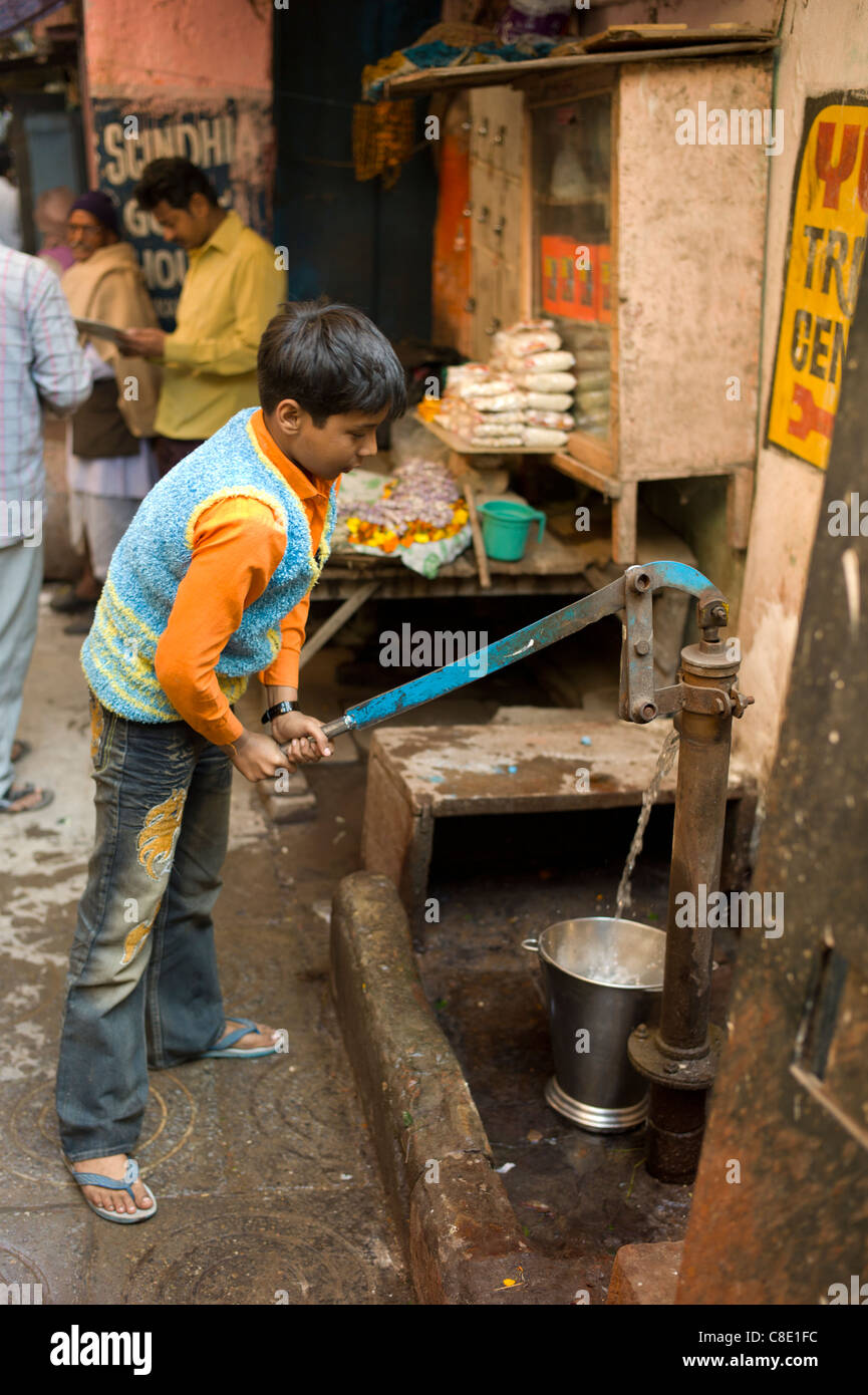 Pumping water india pump hi-res stock photography and images - Alamy