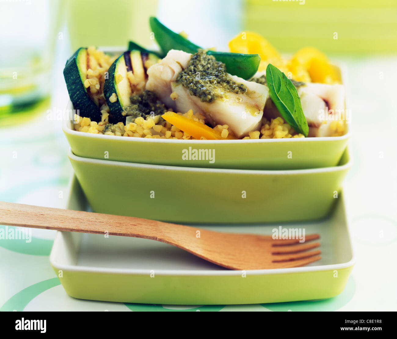 Cod,bulghour and green vegetable salad Stock Photo - Alamy