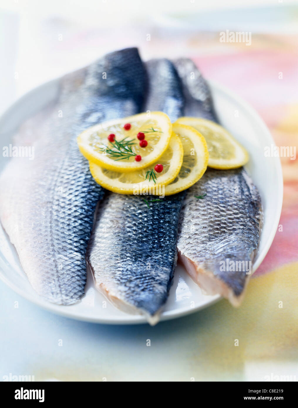 Raw bass fillets Stock Photo - Alamy