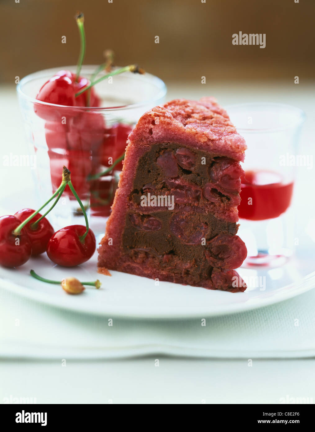 Chocolate and cherry pudding Stock Photo - Alamy