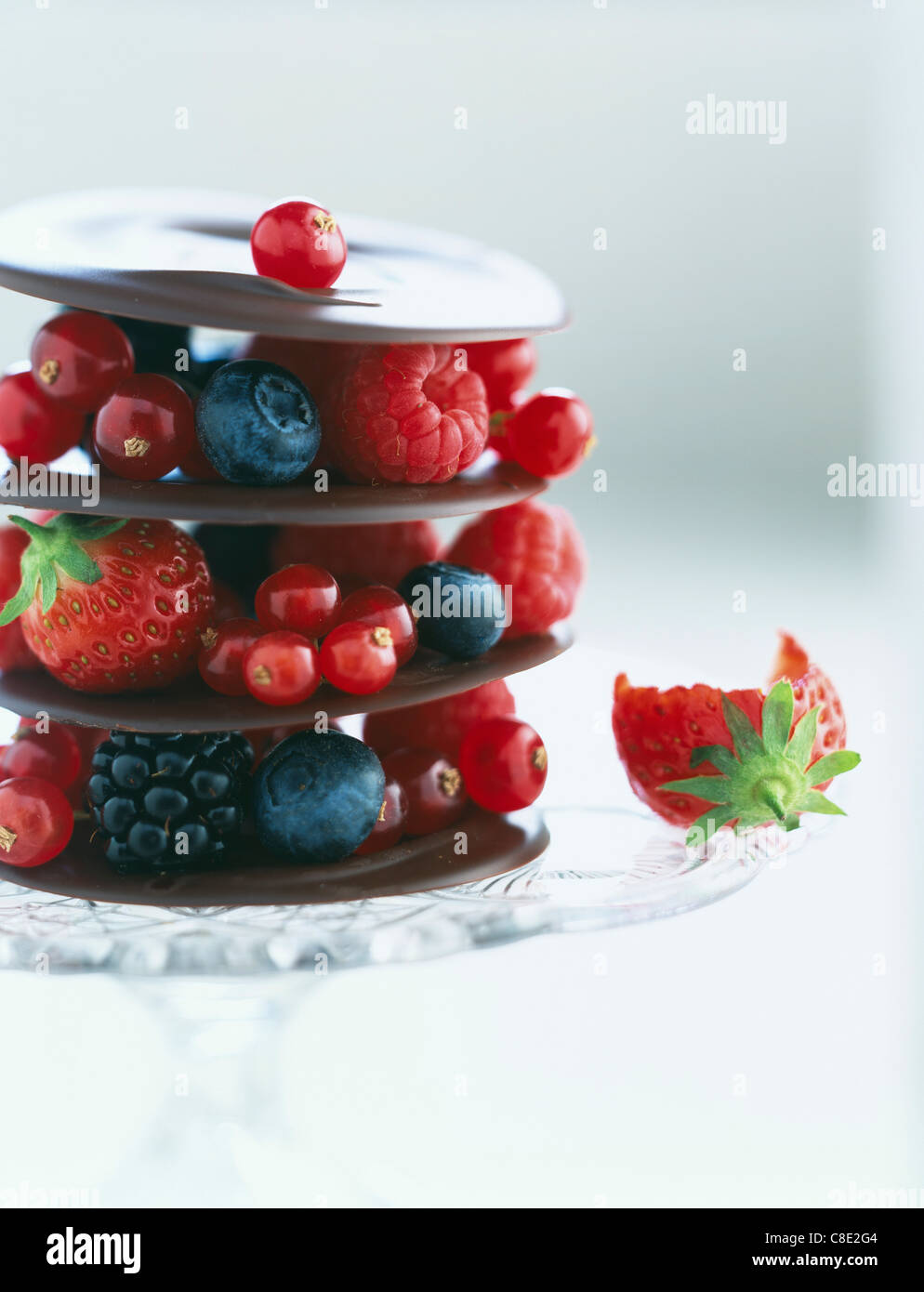 Chocolate discs and summer fruit mille-feuille Stock Photo - Alamy