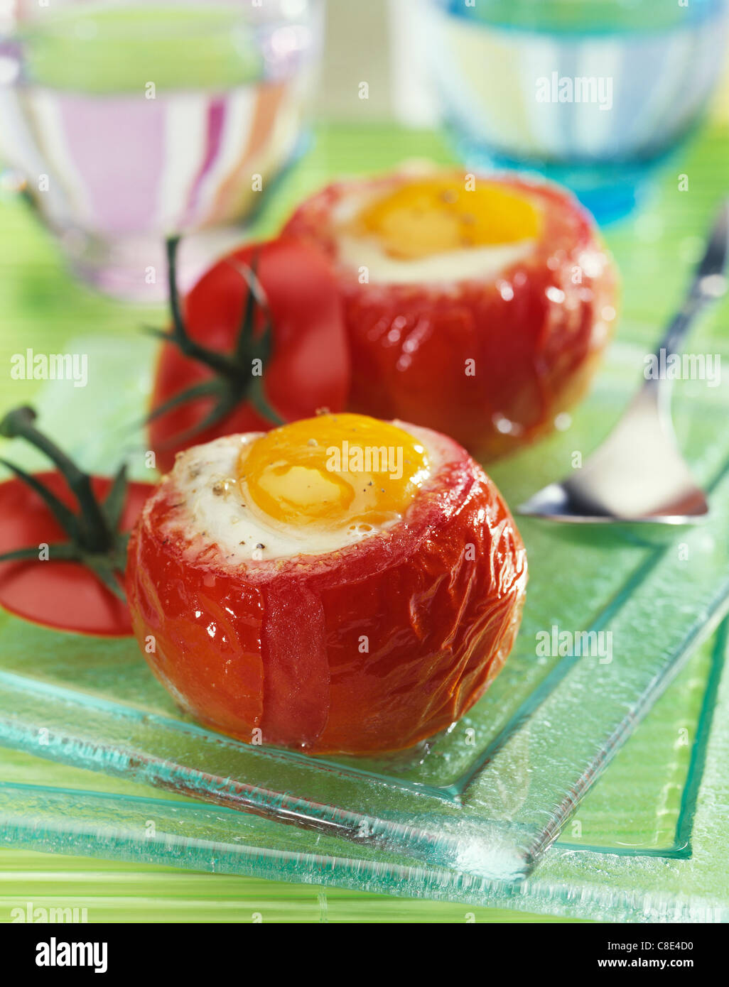 Coddled egg cooked in a tomato Stock Photo - Alamy