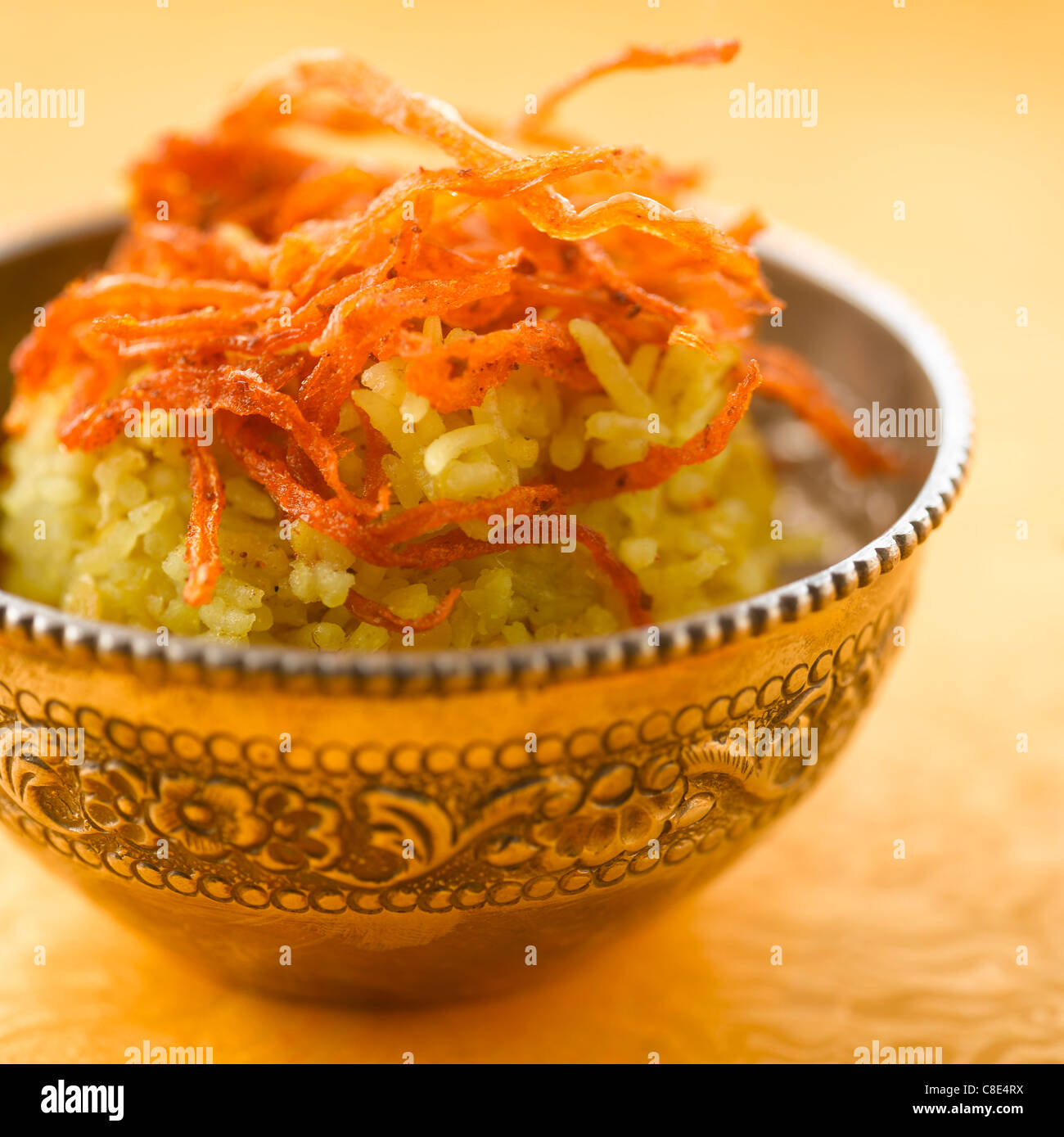 Saffron rice with fried grated carrots Stock Photo - Alamy