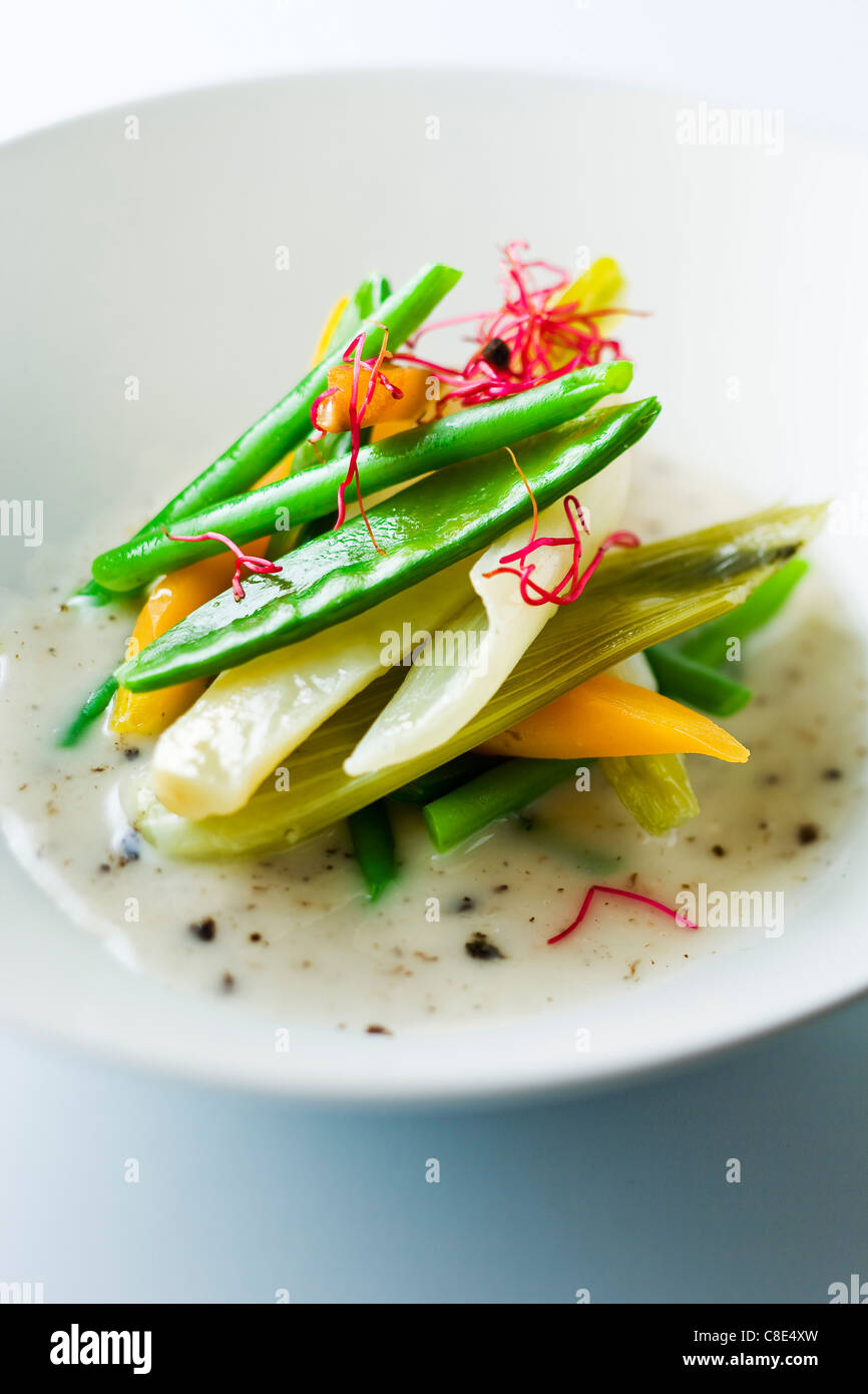 Steam-cooked vegetables with truffle emulsion Stock Photo - Alamy