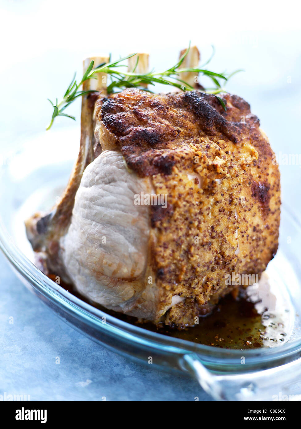 Loin of veal with mustard and honey Stock Photo - Alamy