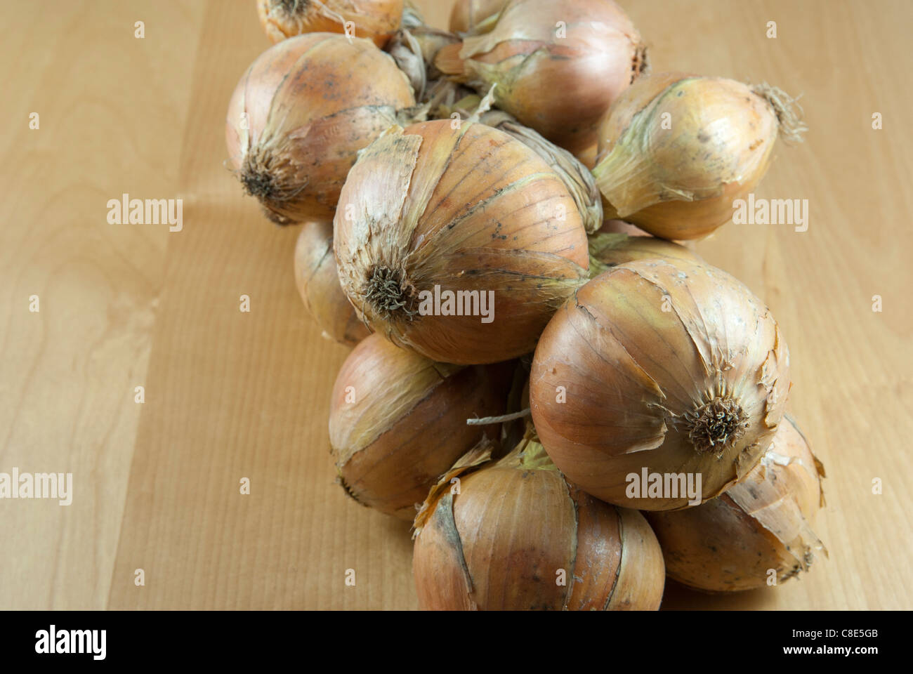 String of onions hi-res stock photography and images - Alamy