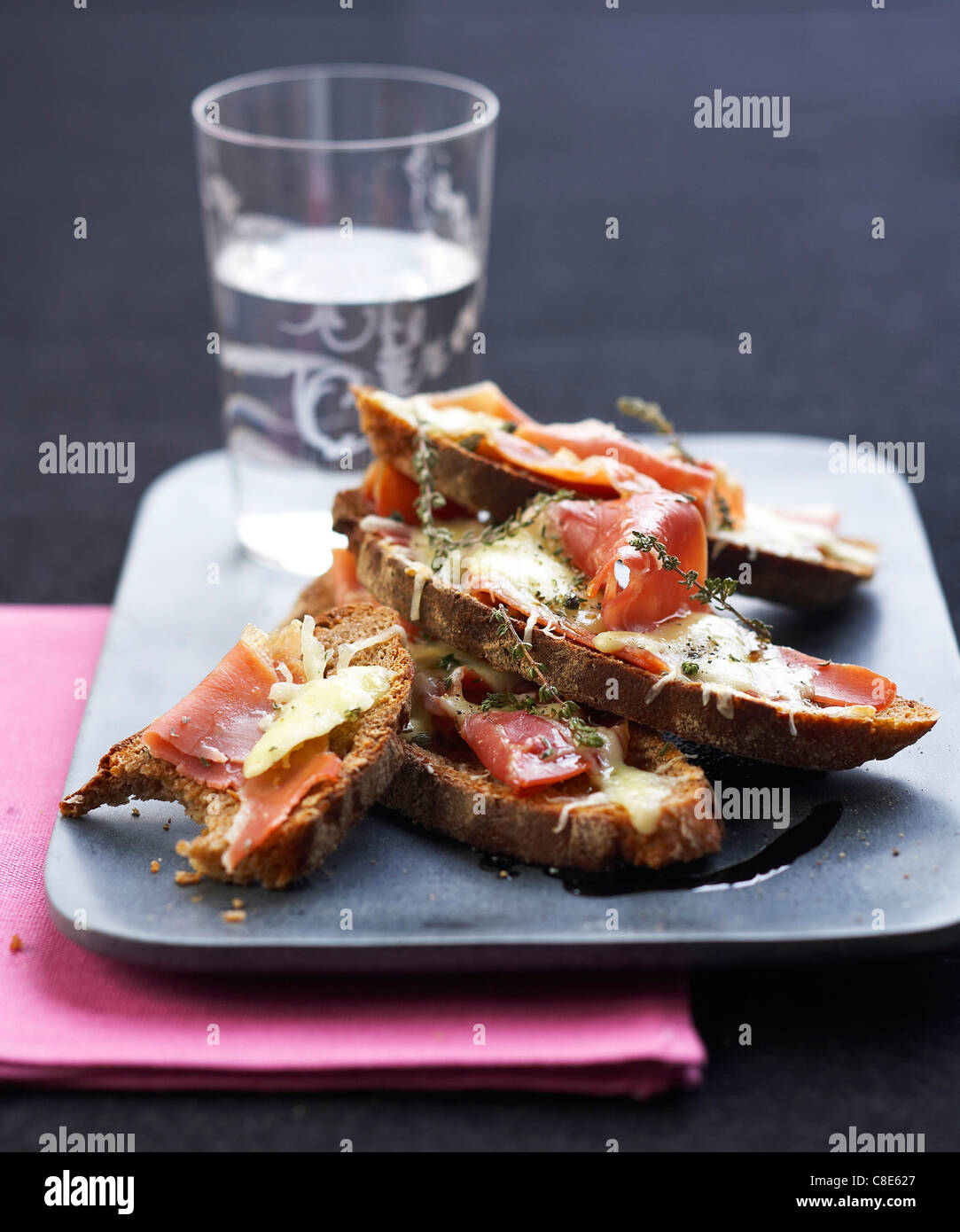 Ham and cheese grilled open sandwiches Stock Photo - Alamy