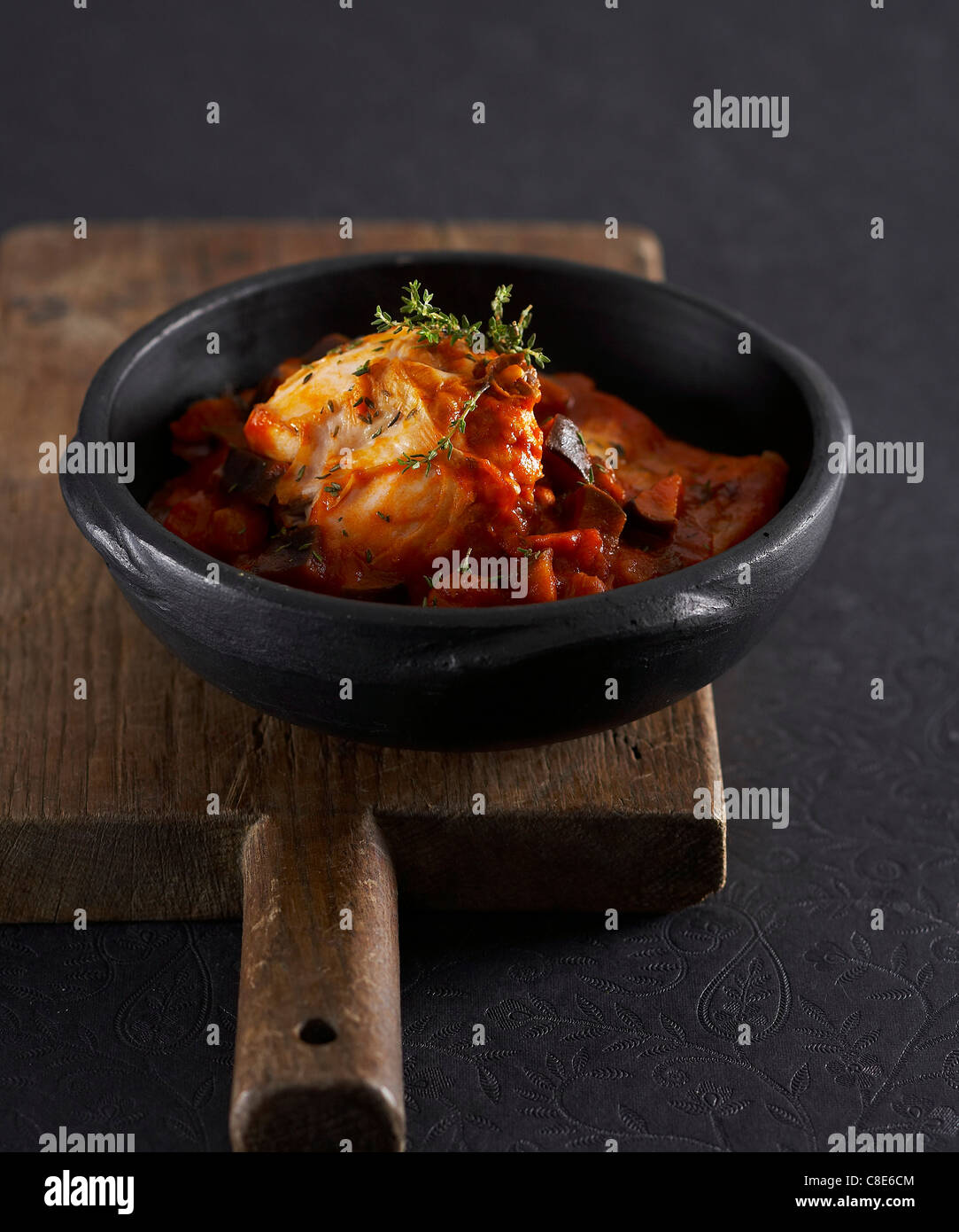 Sauteed rabbit with thyme and eggplants Stock Photo - Alamy