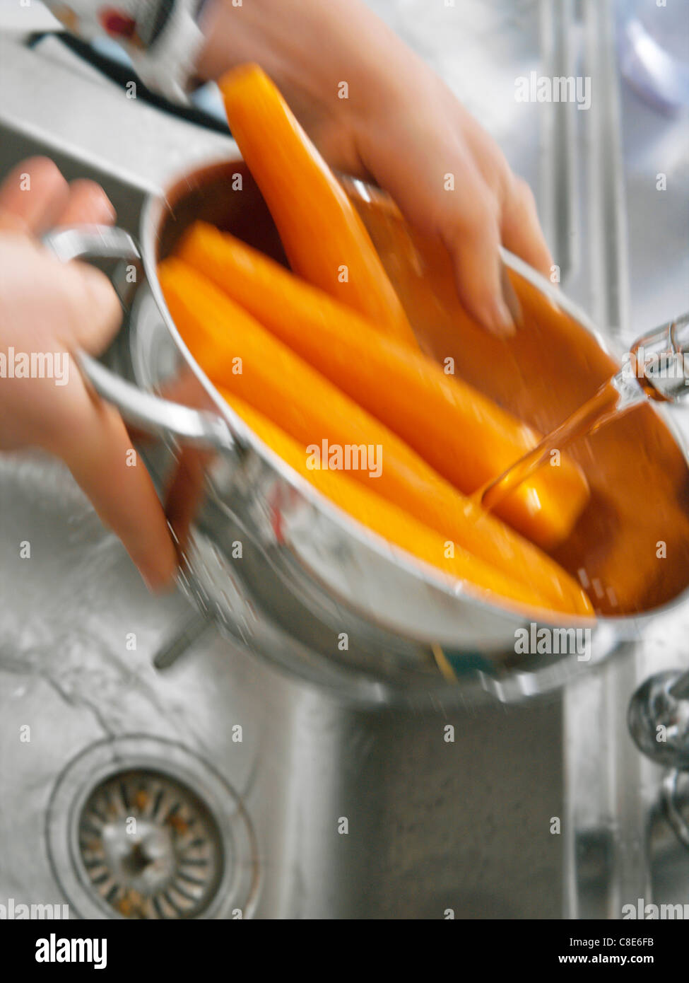 Washing carrots hi-res stock photography and images - Alamy