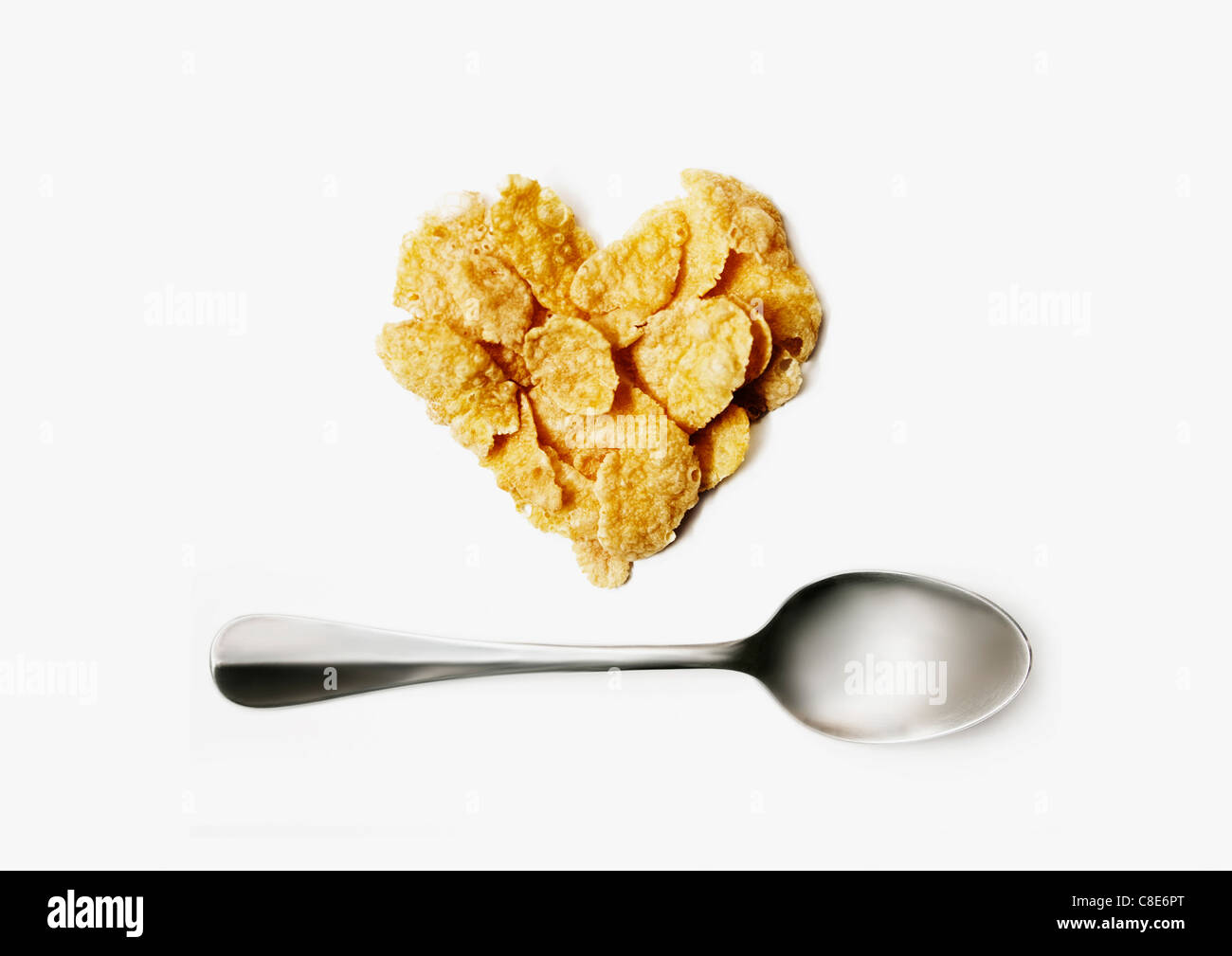 Cornflake heart and spoon Stock Photo - Alamy