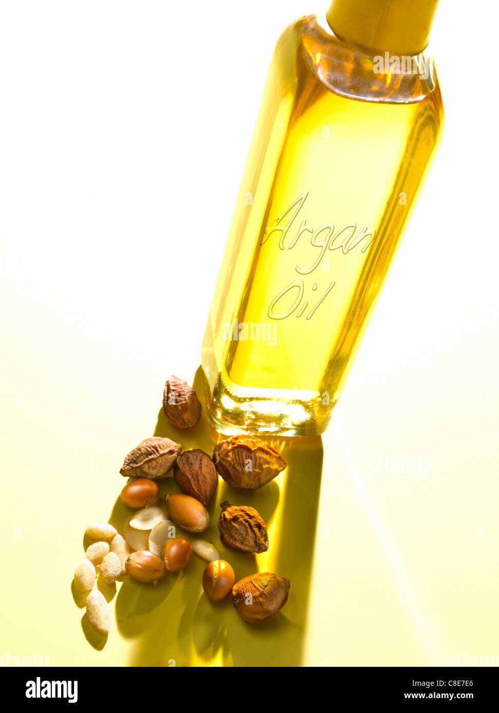 Bottle of argan oil and argan nuts Stock Photo - Alamy