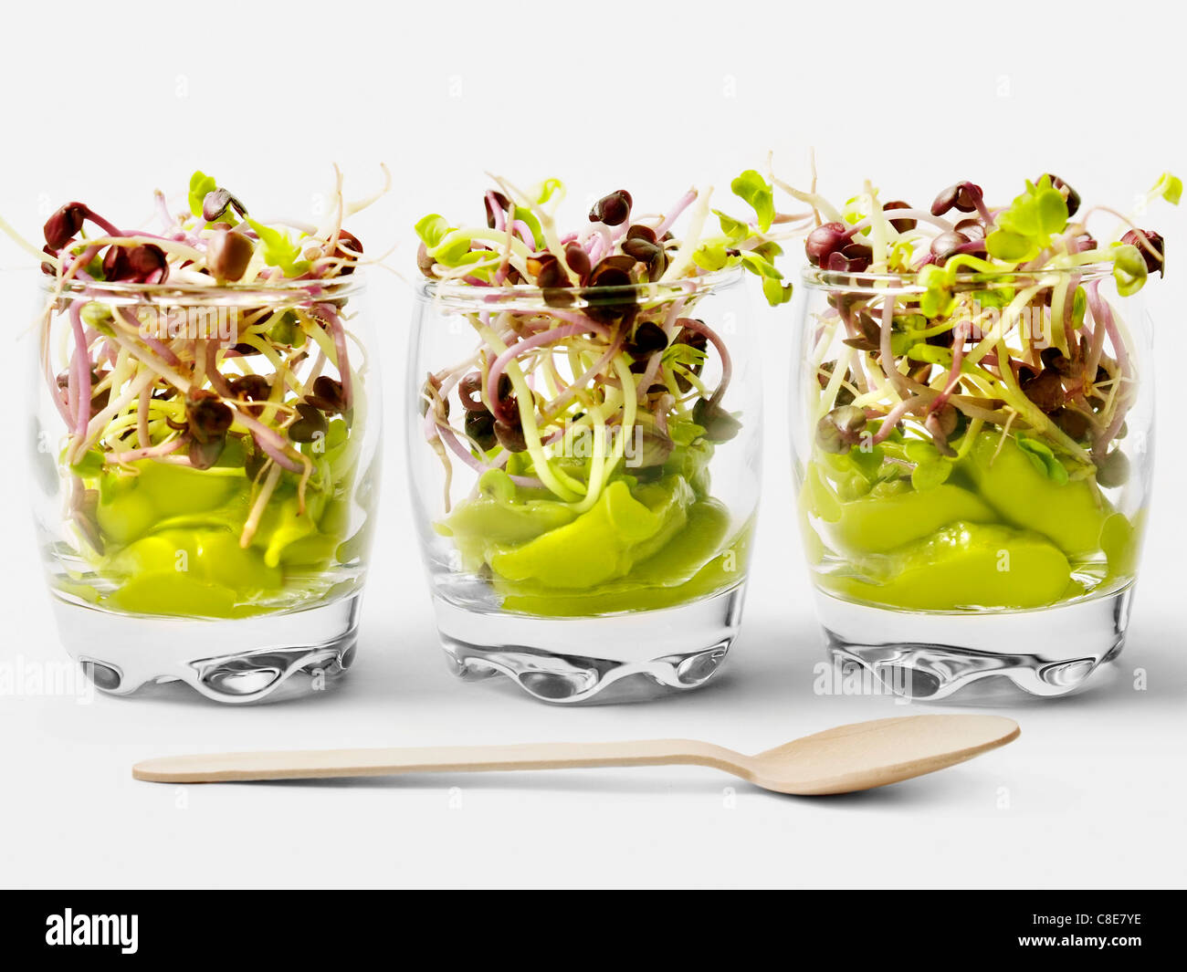 Guacamole with beansprouts and lentil shoots Stock Photo - Alamy