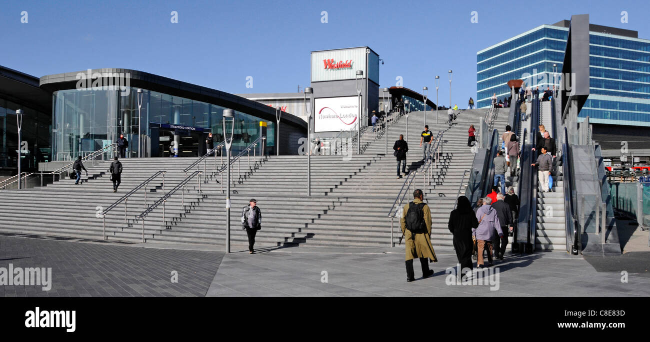 London street scene multicultural people using steps & escalator to ...