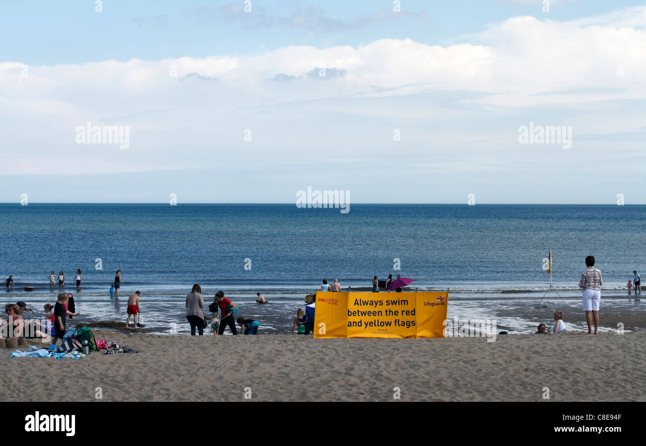 The beach at Sutton-on-Sea. Always swim between the two red and yellow ...