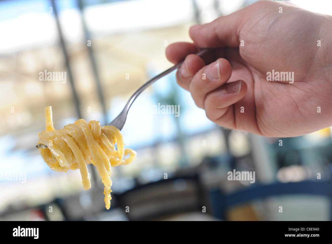 pasta forkful in a restaurant Stock Photo - Alamy