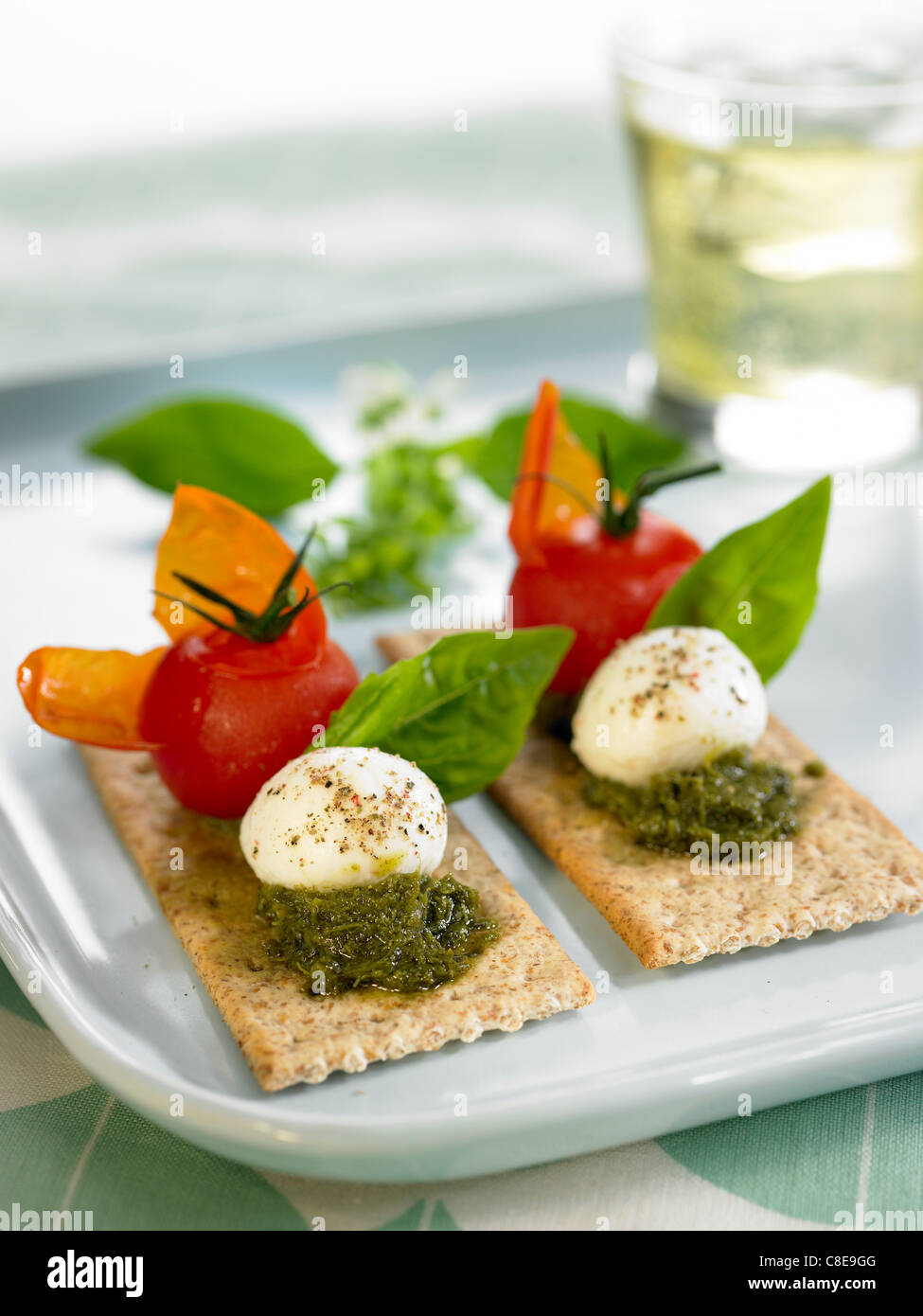 Egg,tomato,basil and pesto canapés Stock Photo - Alamy