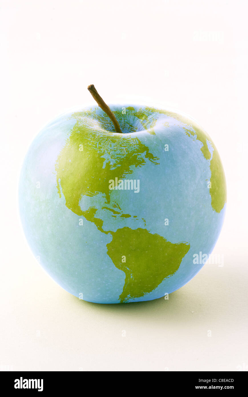 Globe on an apple Stock Photo - Alamy