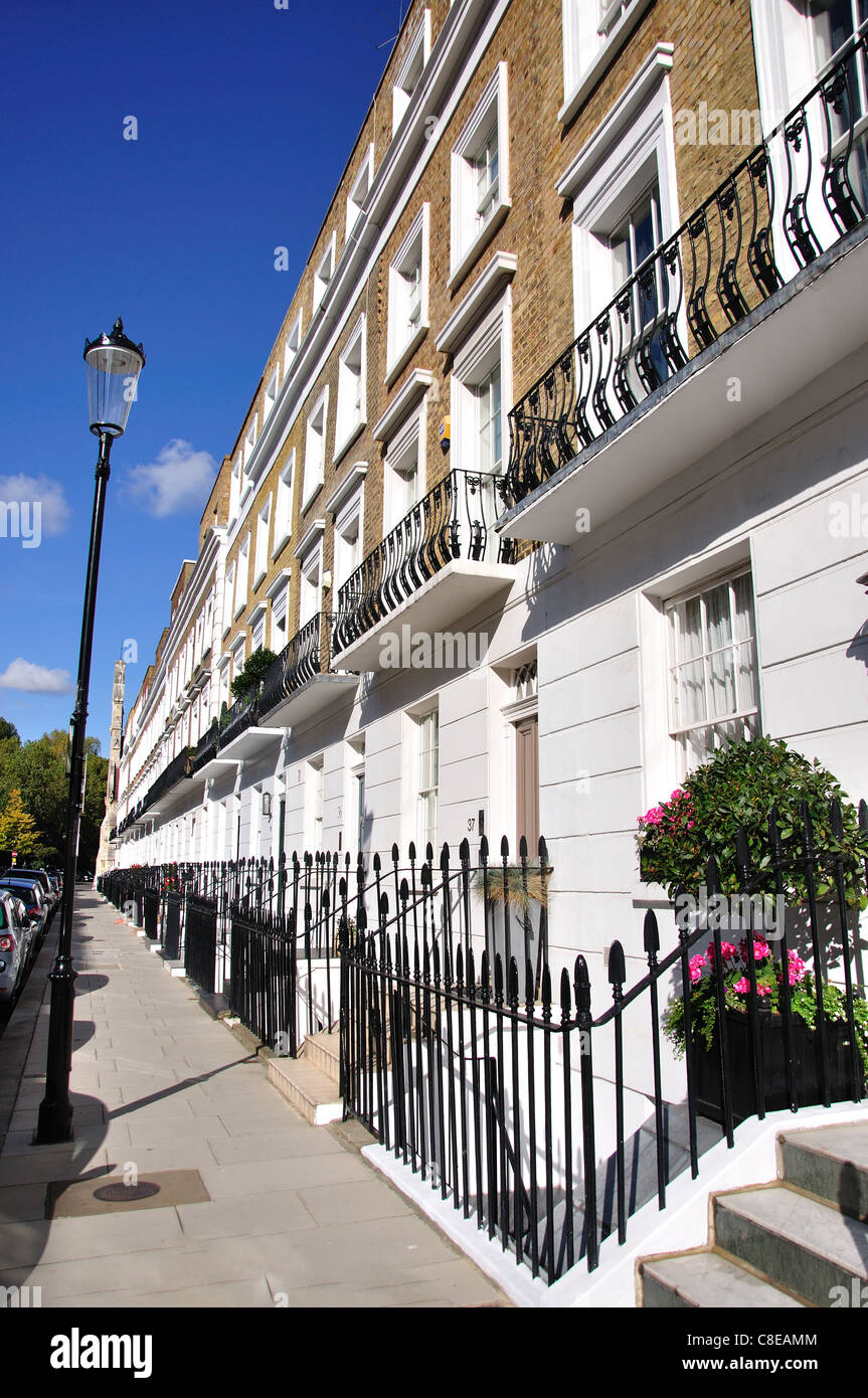 White stucco fronted terrace houses, Moore Street, Chelsea, Royal ...