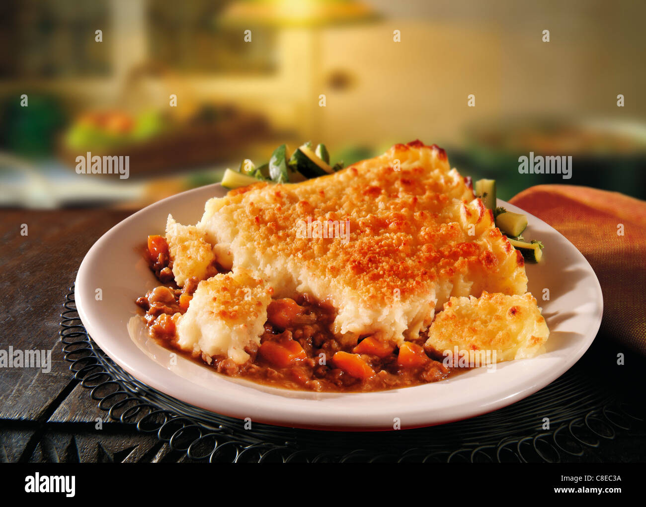 Traditional hot cooked British Cumberland potato and meat pie served on ...