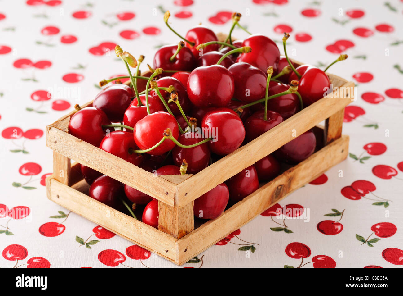 Small crate of cherries Stock Photo - Alamy