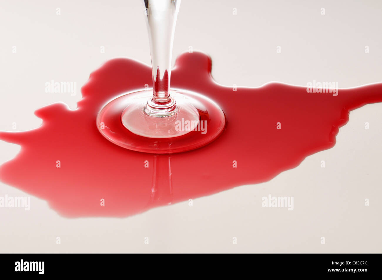 Spilt red wine and glass stem Stock Photo - Alamy