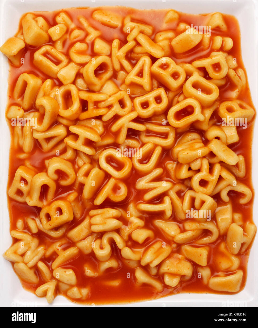 Alphabetic pasta in tomato sauce Stock Photo - Alamy