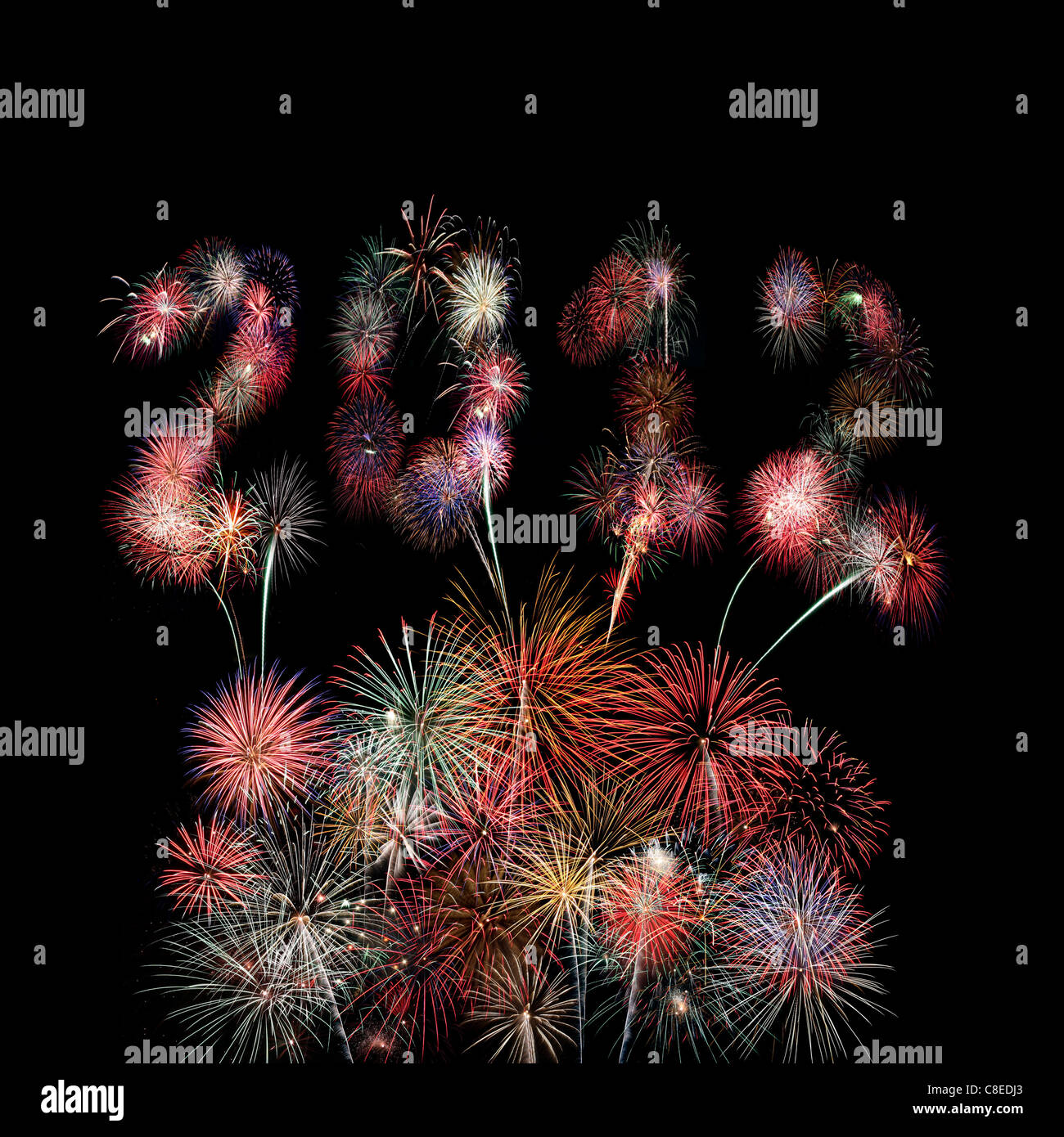 The year 2012 written in fireworks over a pyrotechnic display in a ...