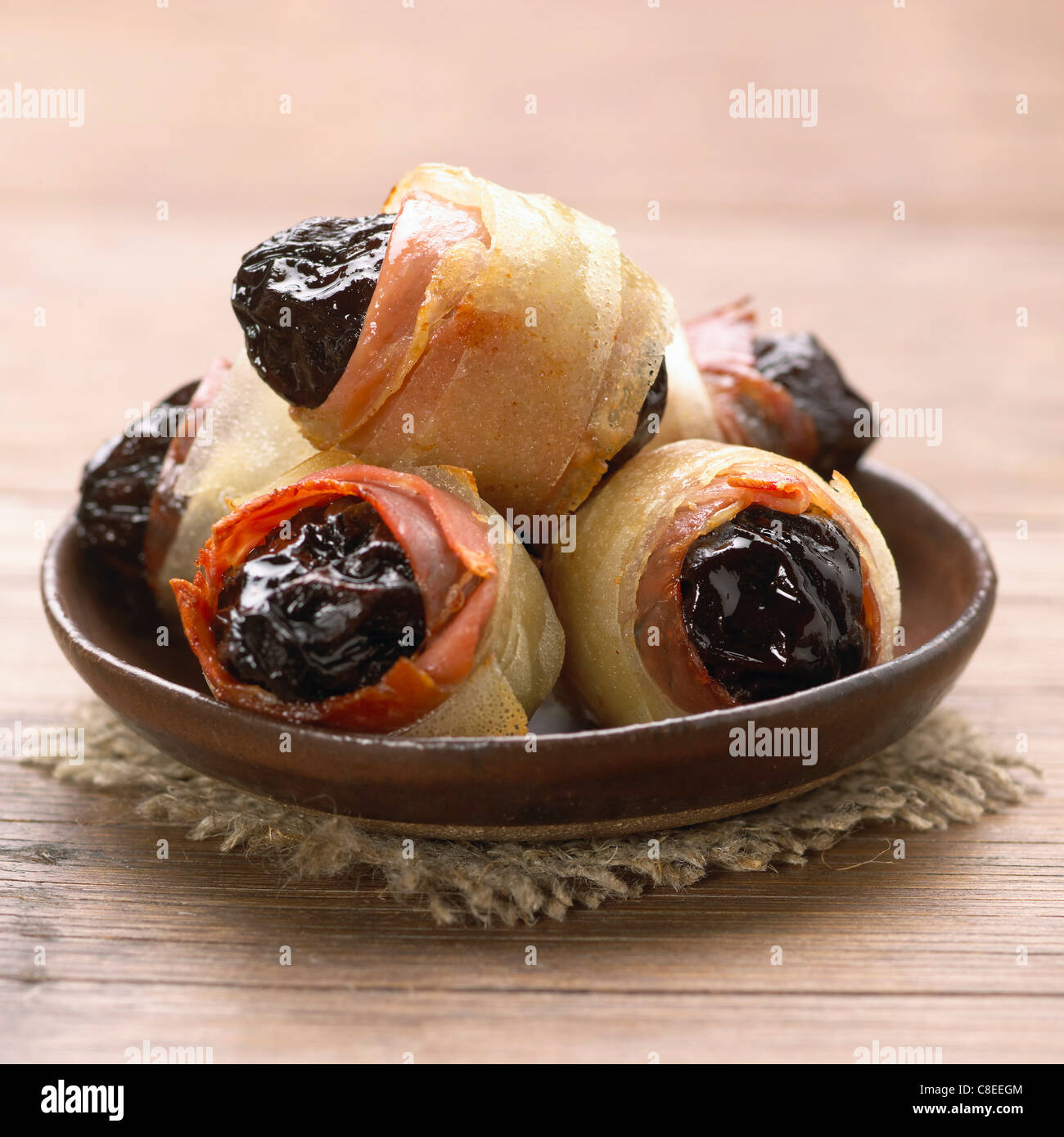 Bacon and filo pastry plum rolls Stock Photo - Alamy