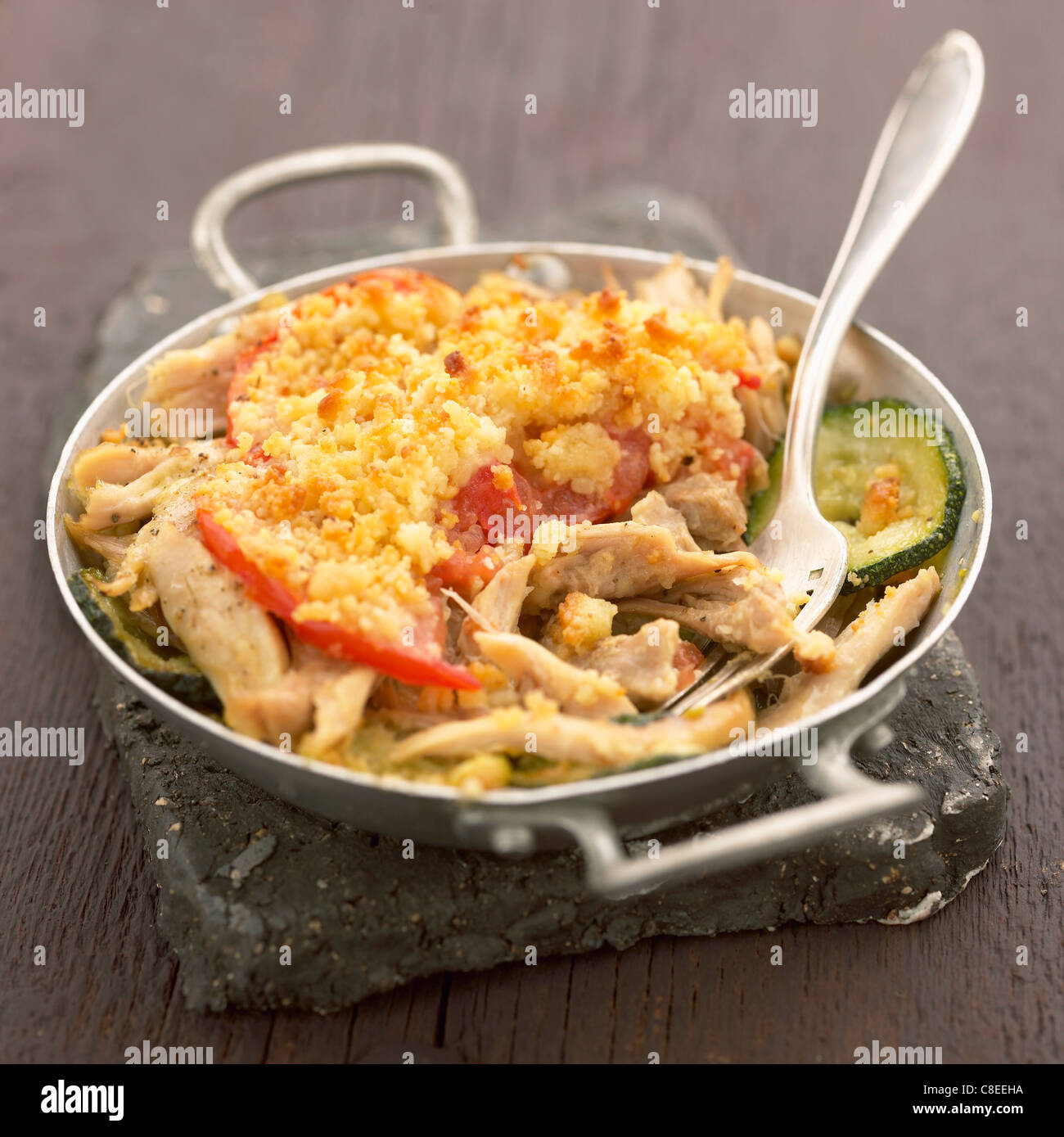 Landes chicken and vegetable savoury crumble Stock Photo - Alamy