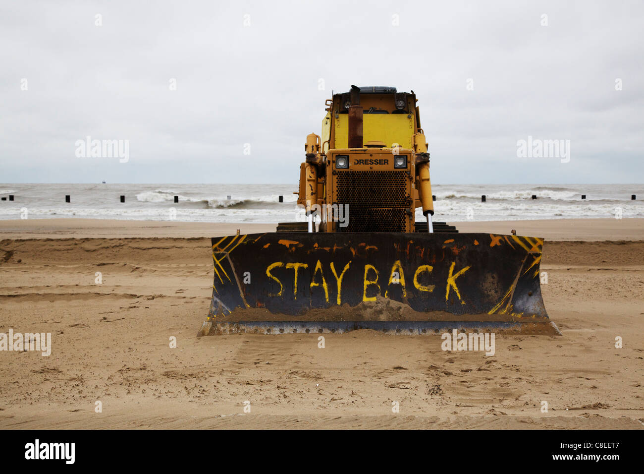 A bulldozer turned into a warning sign on North Avenue Beach during a ...
