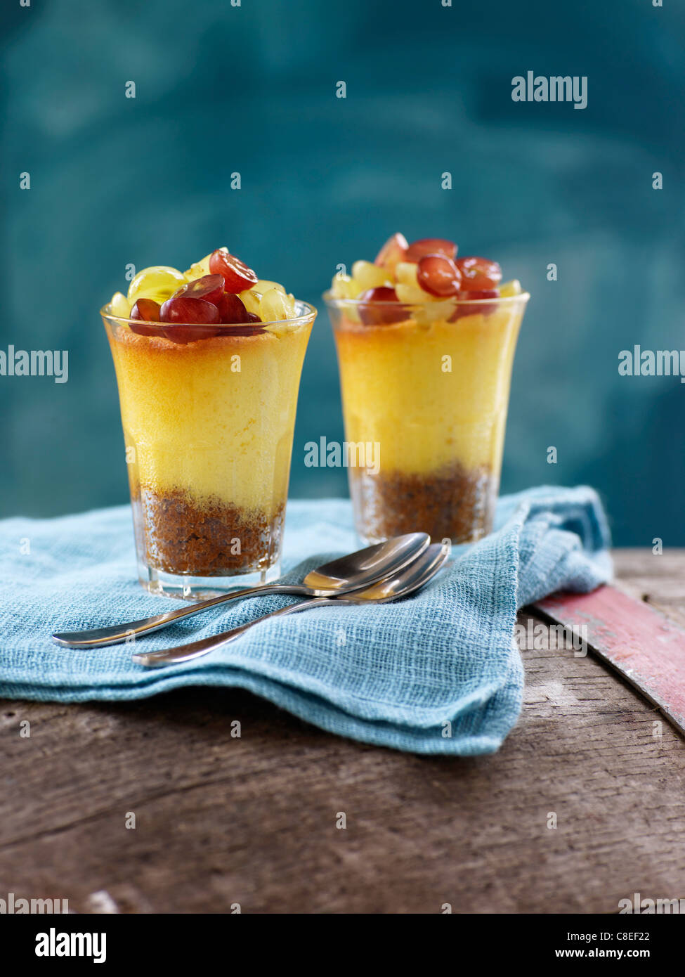Cheesecake with black and white grapes served in Verrines Stock Photo ...