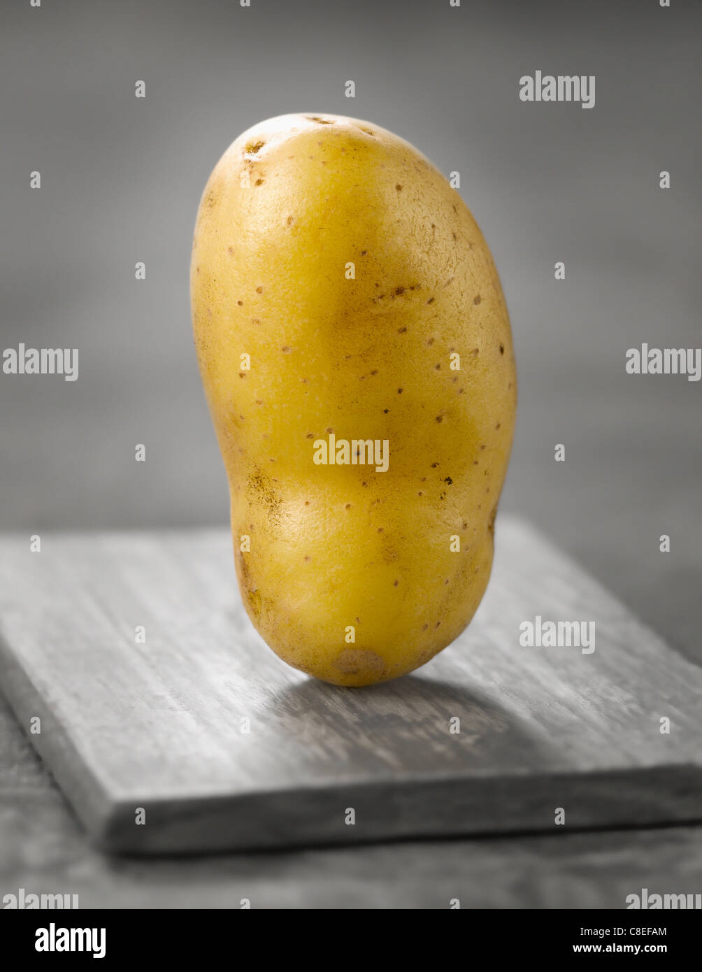 Potato standing up Stock Photo - Alamy