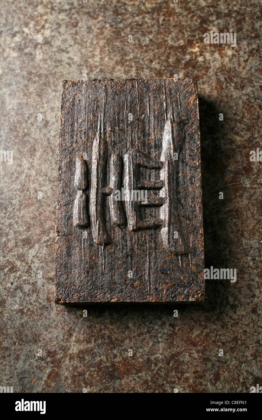 Brick of black tea Stock Photo - Alamy