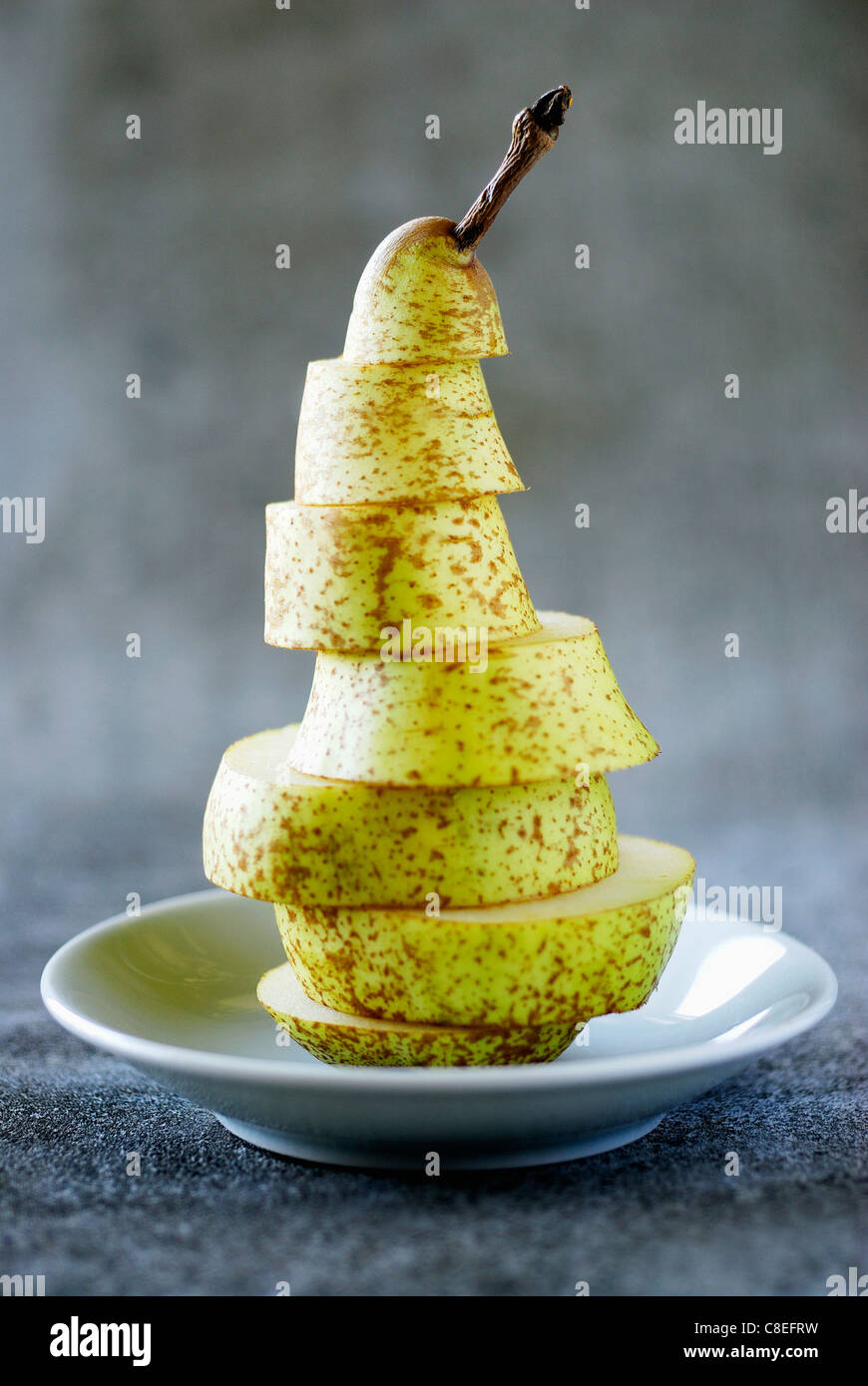 Conférence pear sliced horizontally Stock Photo - Alamy