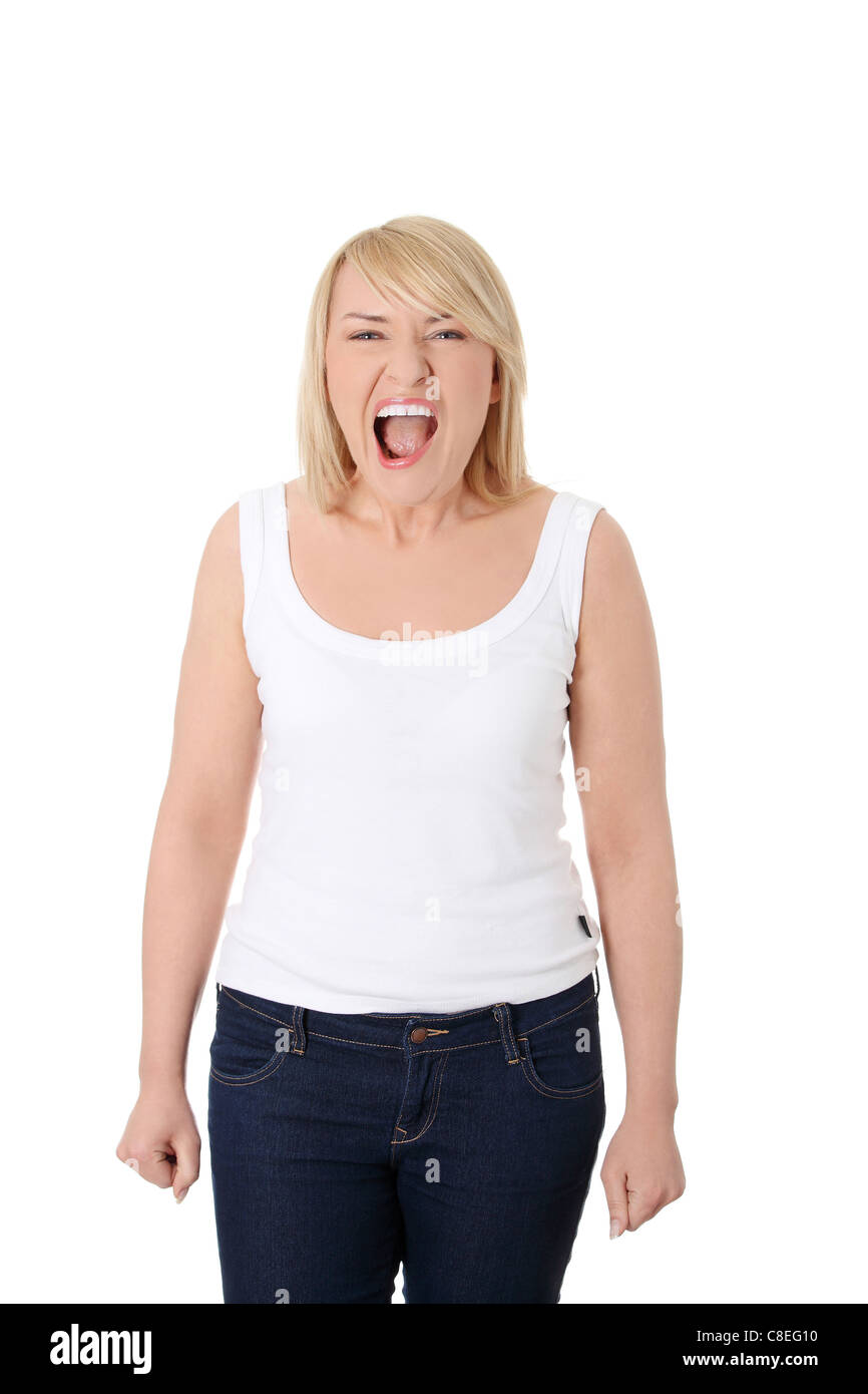 Pretty caucasian woman standing and screaming. Isolated on white Stock ...