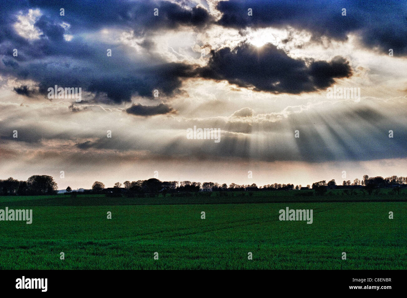 Heaven and light dramatic heavy sky Stock Photo - Alamy